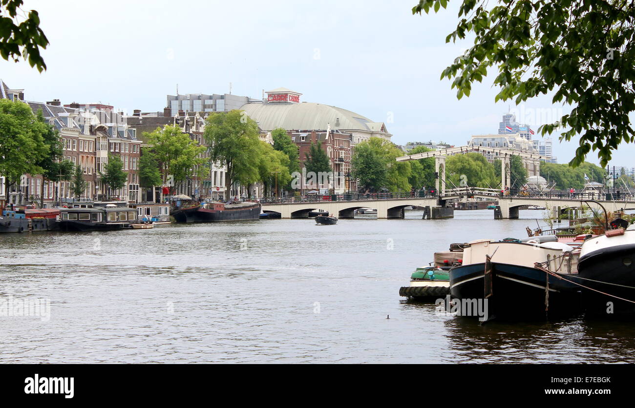 Magere Brug or 'Skinny Bridge' spanning across the river Amstel in the ...