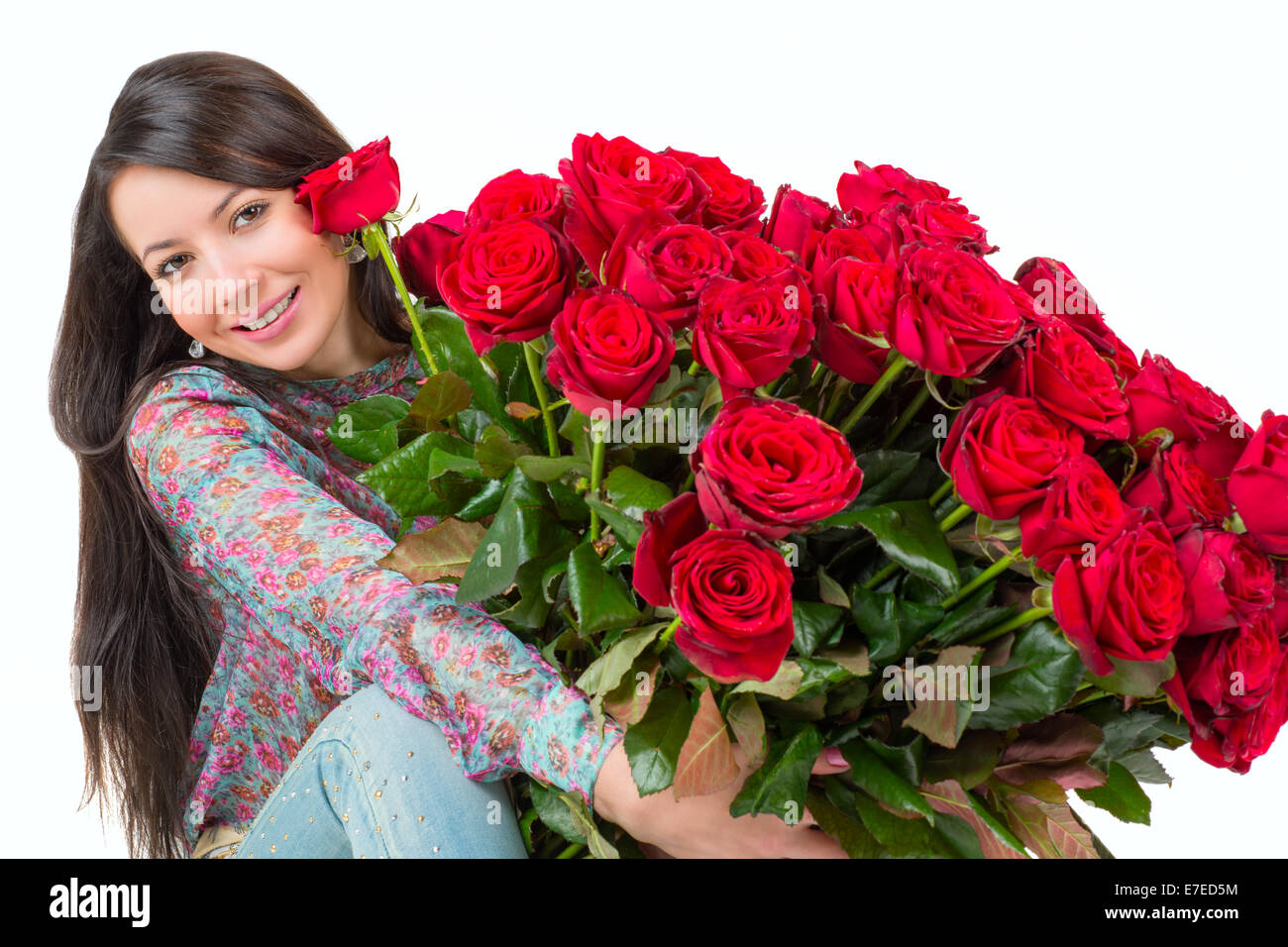 Young woman c bouquet of red roses Stock Photo - Alamy