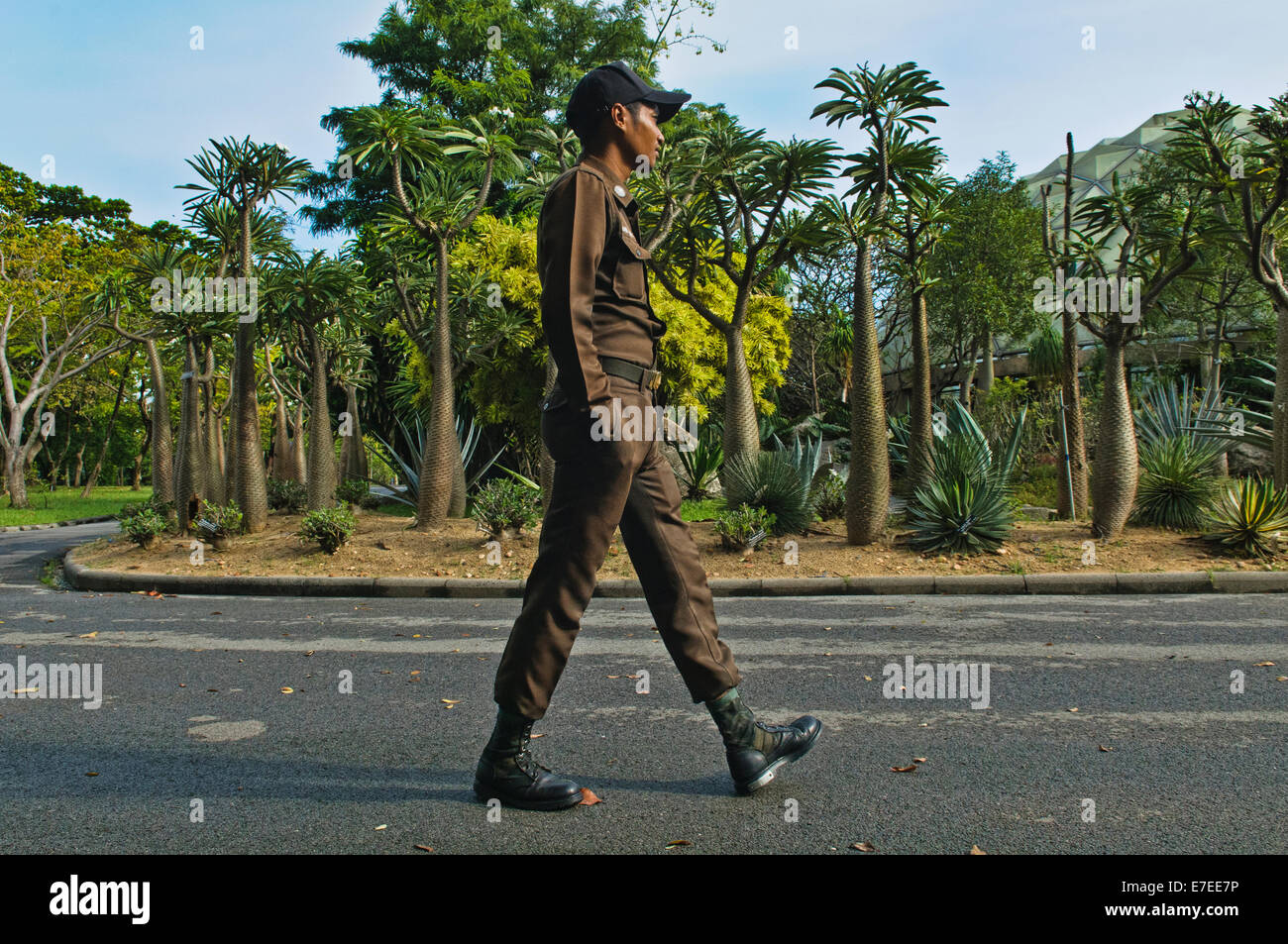Guard at a public park in Bangkok, Thailand Stock Photo - Alamy