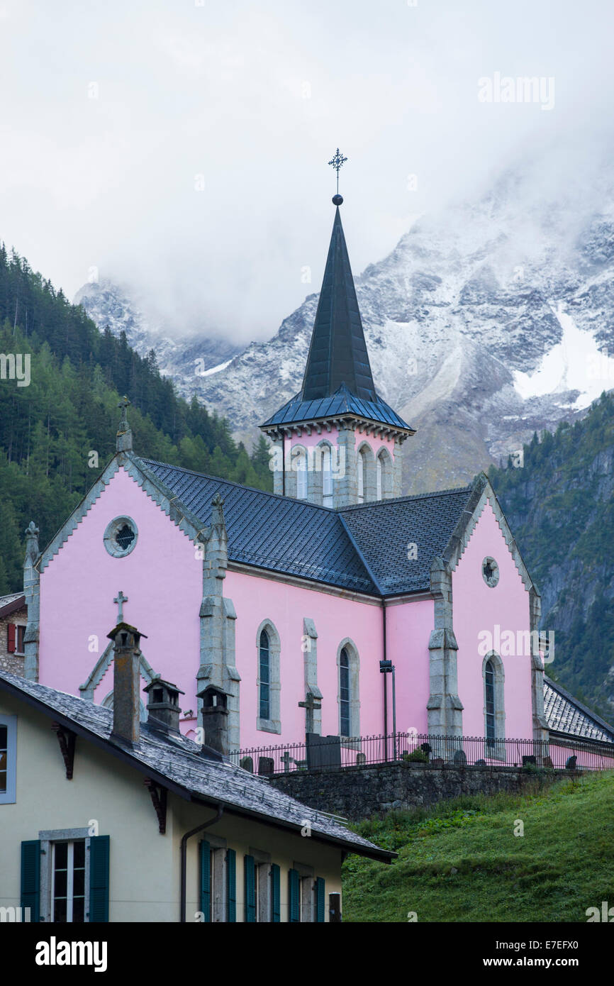 The pink church in Trient in the Swiss Alps Stock Photo - Alamy