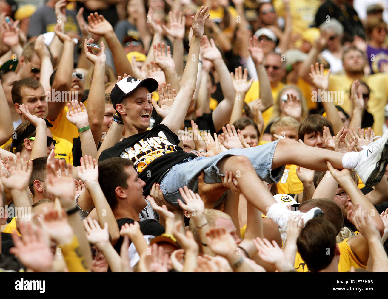 Iowa City, Iowa, USA. 30th Aug, 2014. A University of Iowa fan is ...