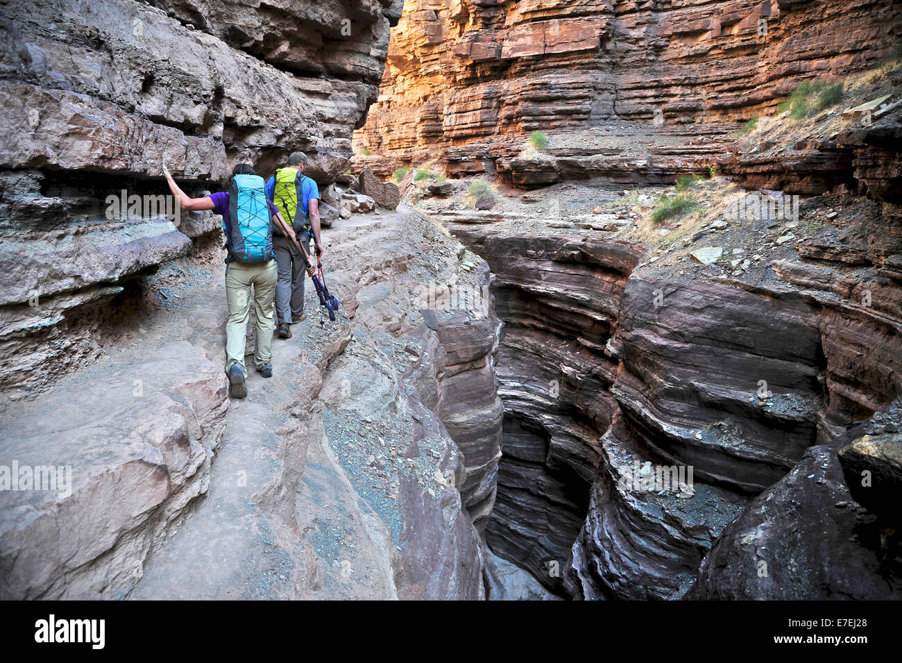 Hikers walk along Deer Creek Narrows in the Grand Canyon outside of ...