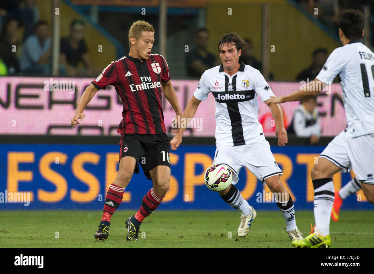 Parma, Italy. 14th Sep, 2014. Keisuke Honda (Milan), Paolo De Ceglie ...