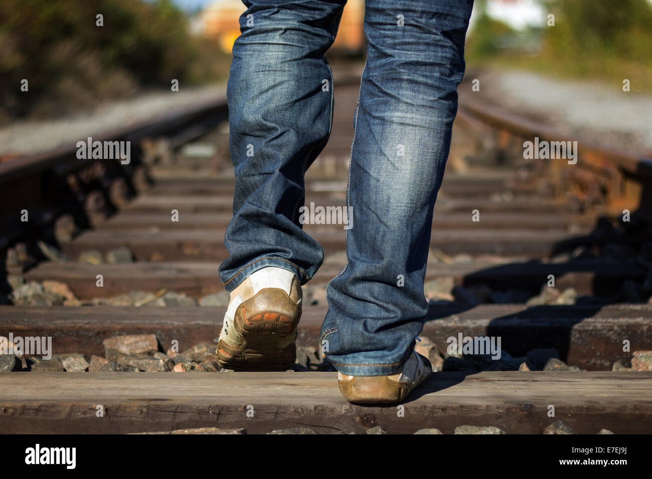 Man walking on railway track hi-res stock photography and images - Alamy