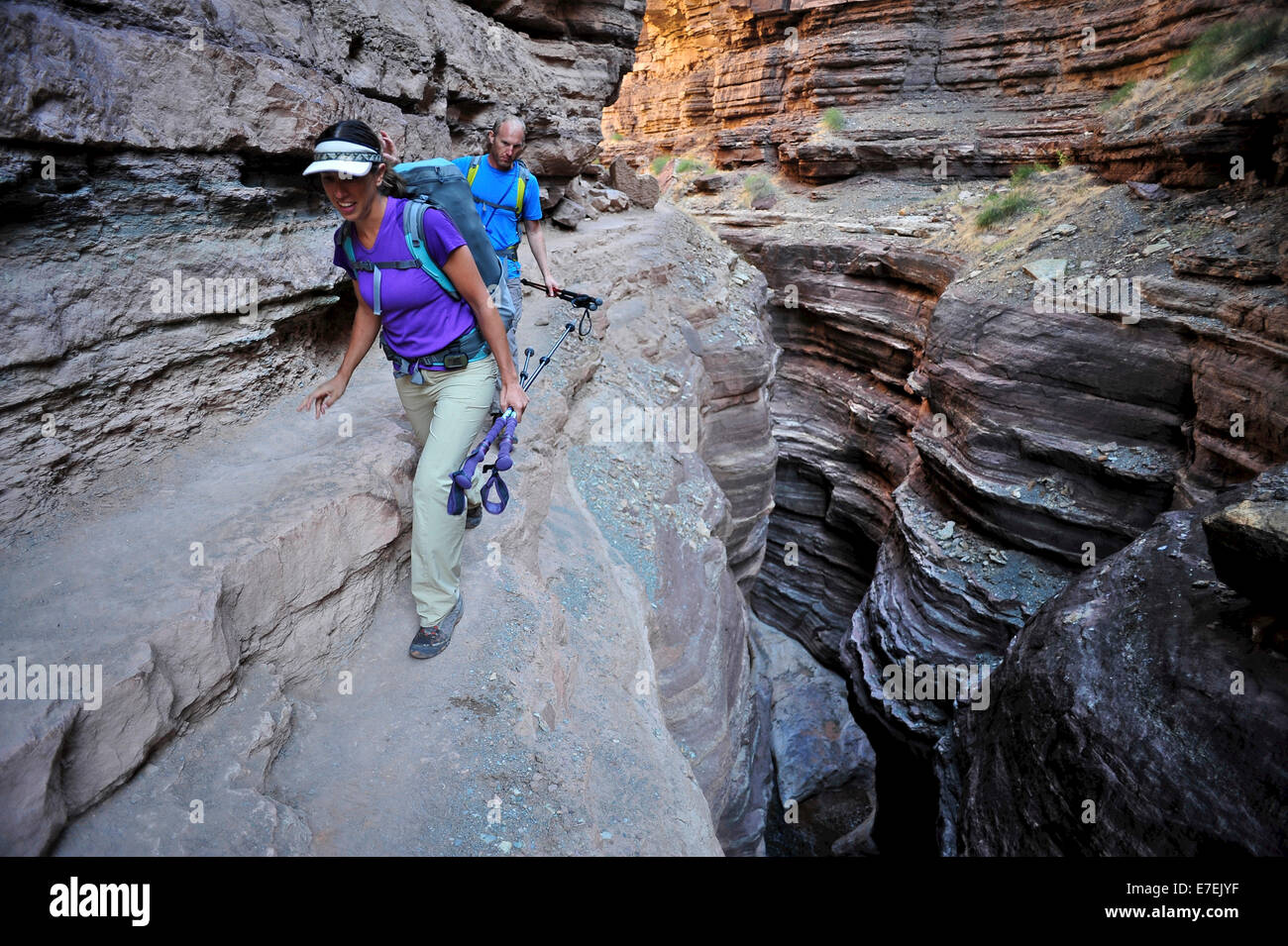 Hikers walk along Deer Creek Narrows in the Grand Canyon outside of ...