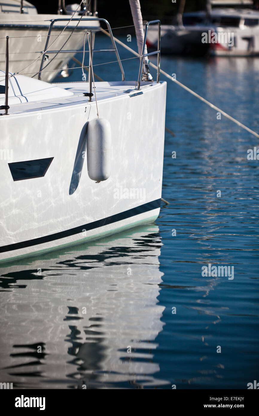 Sailboat Side CloseUp. Vertical shot with reflections Stock Photo - Alamy