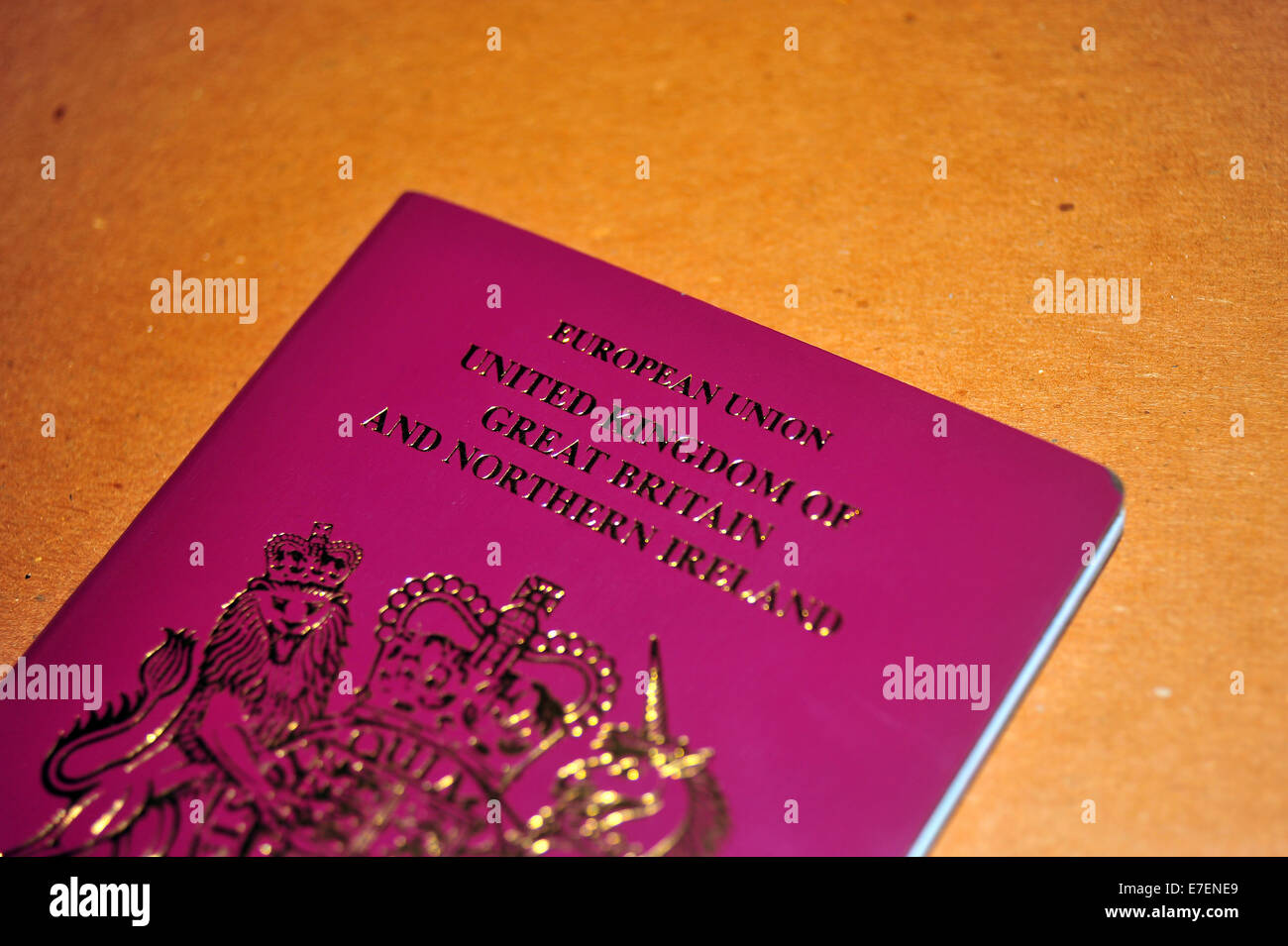 Image of a 2010 British passport photographed against a card background ...