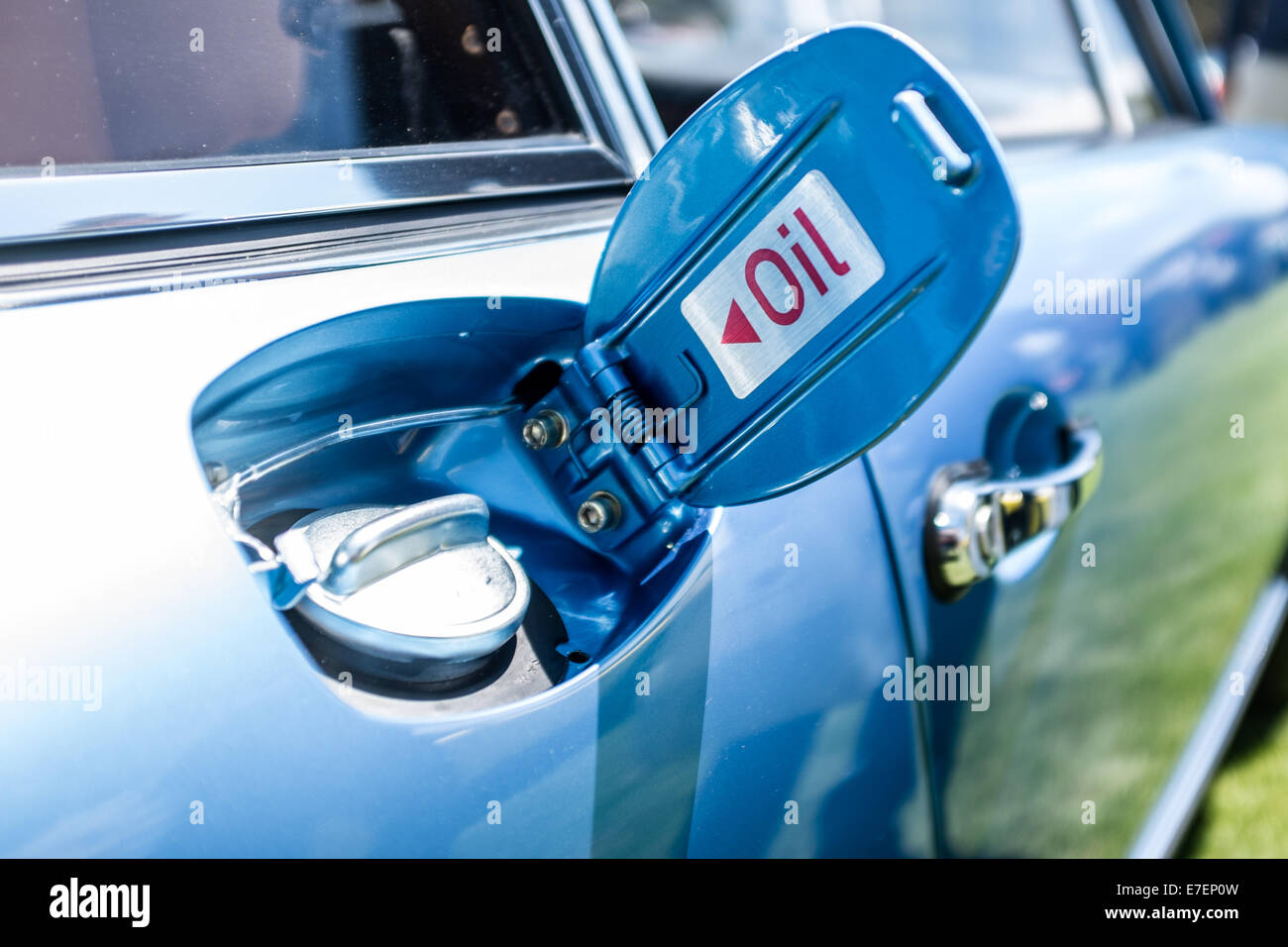 Oil sign on classic car Stock Photo - Alamy