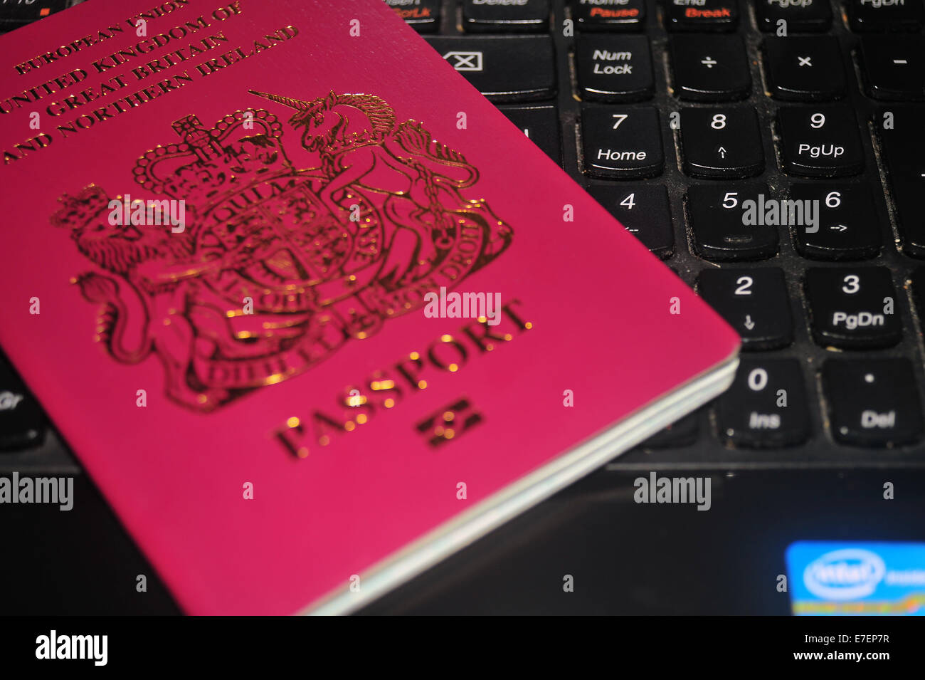 Image of a 2010 British passport photographed against a computer ...