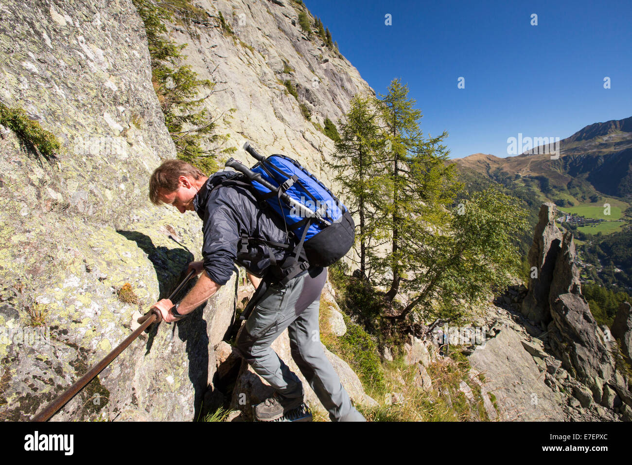 Man climbing ladder hi-res stock photography and images - Alamy