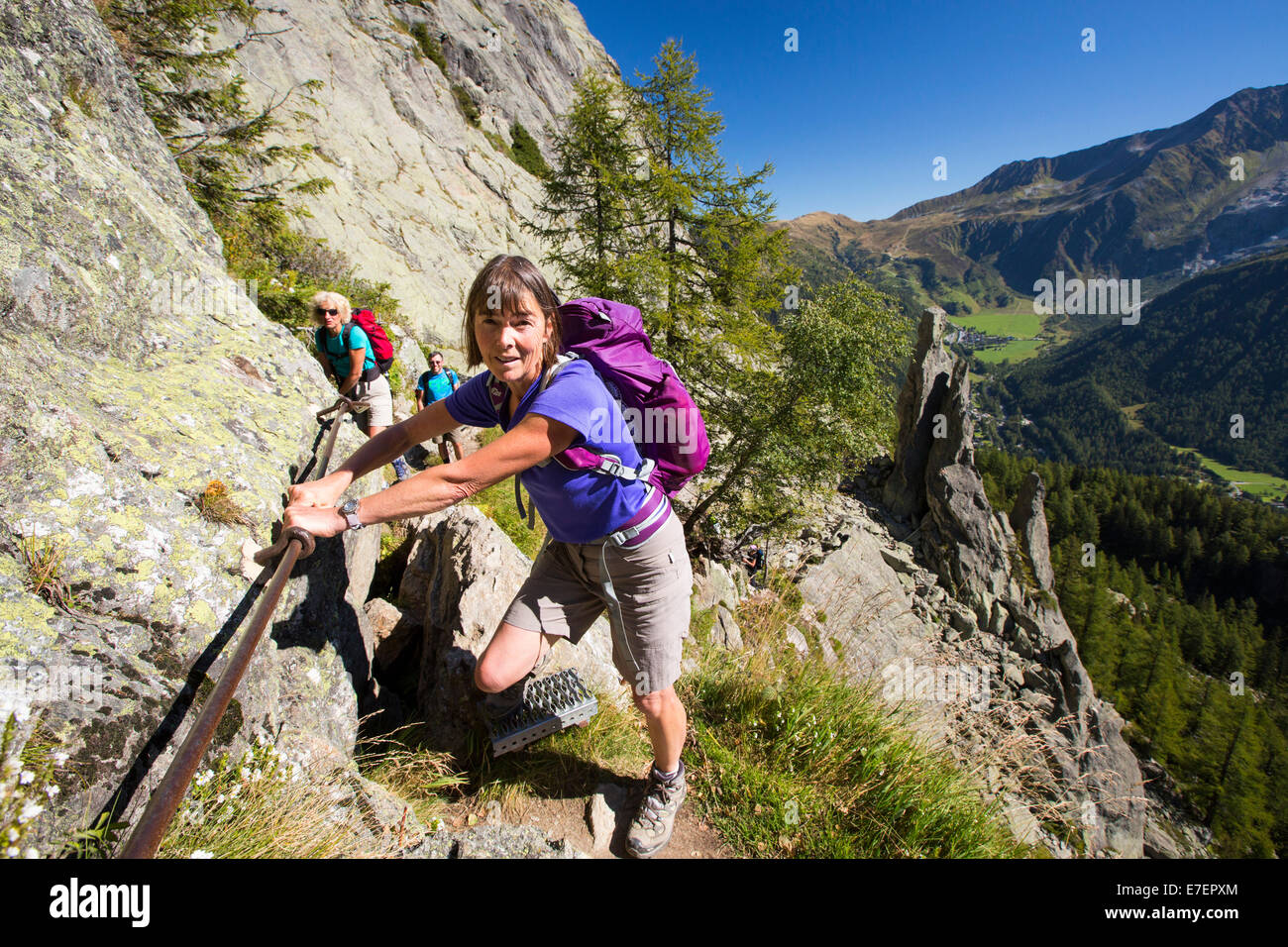 Woman climbing ladders in aiguille hi-res stock photography and images ...