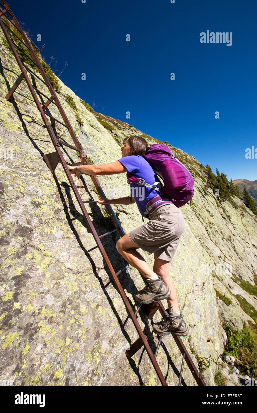 Woman Climbing Ladder at Dorothy Boots blog
