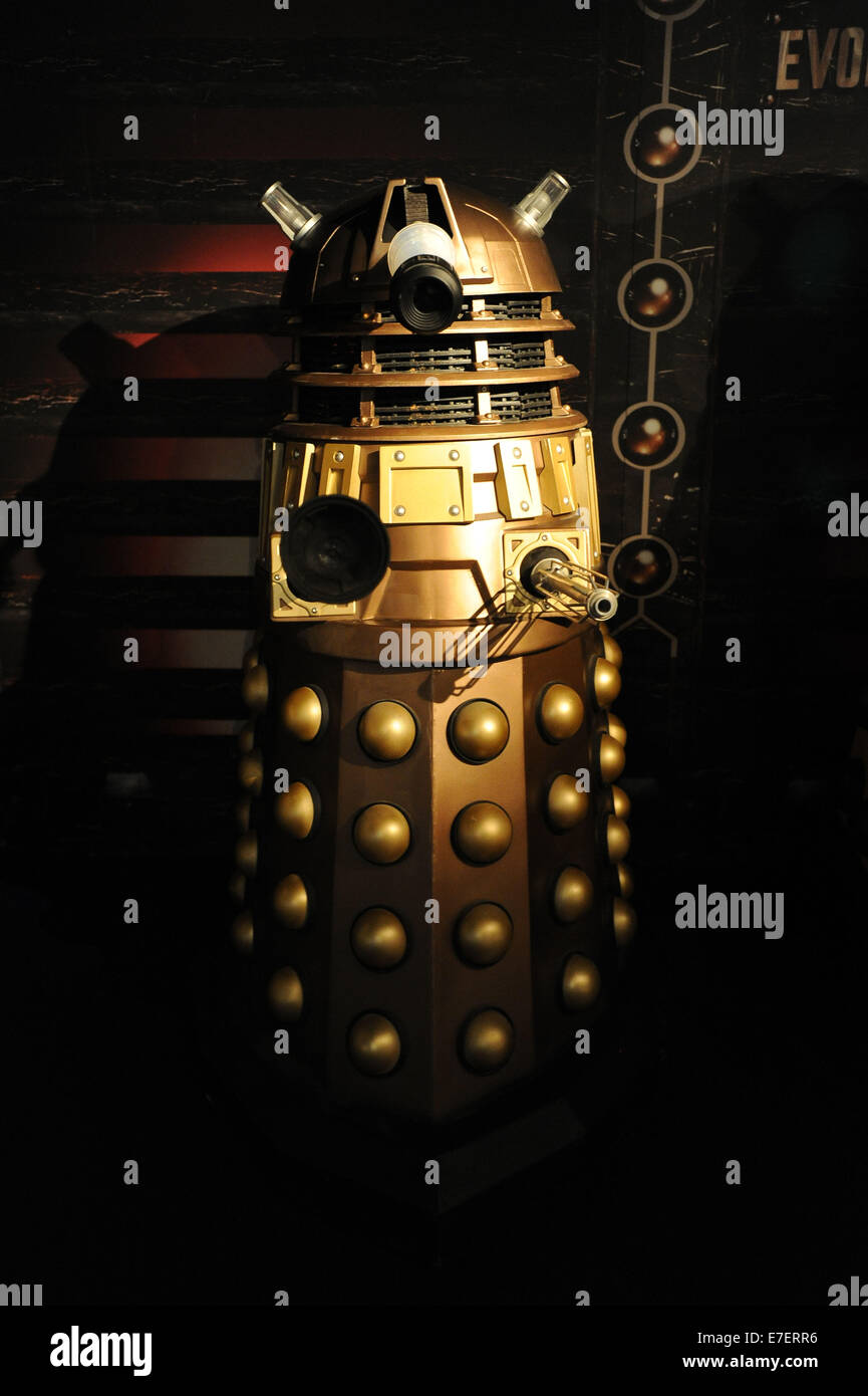 A golden coloured dalek on display at the Doctor Who Experience in ...