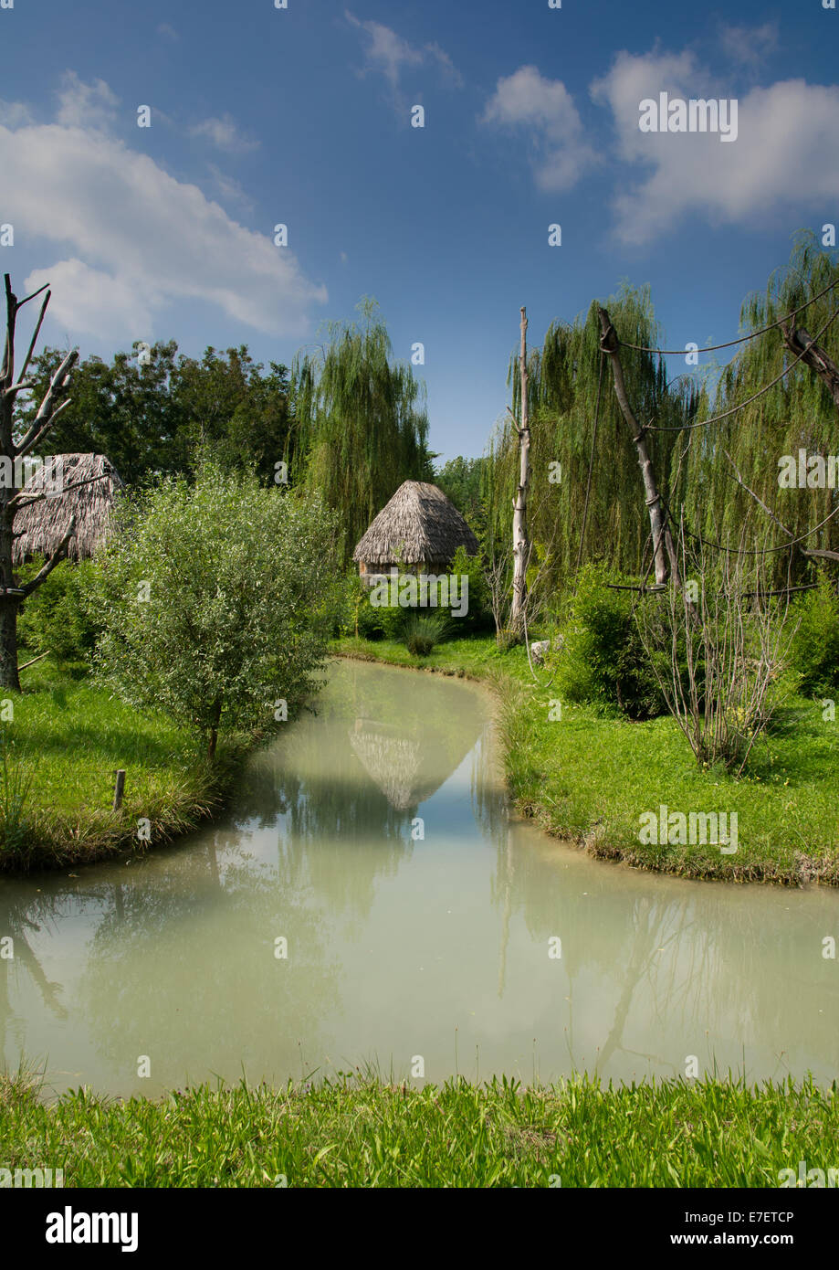 thatched hut on the river bank Stock Photo - Alamy