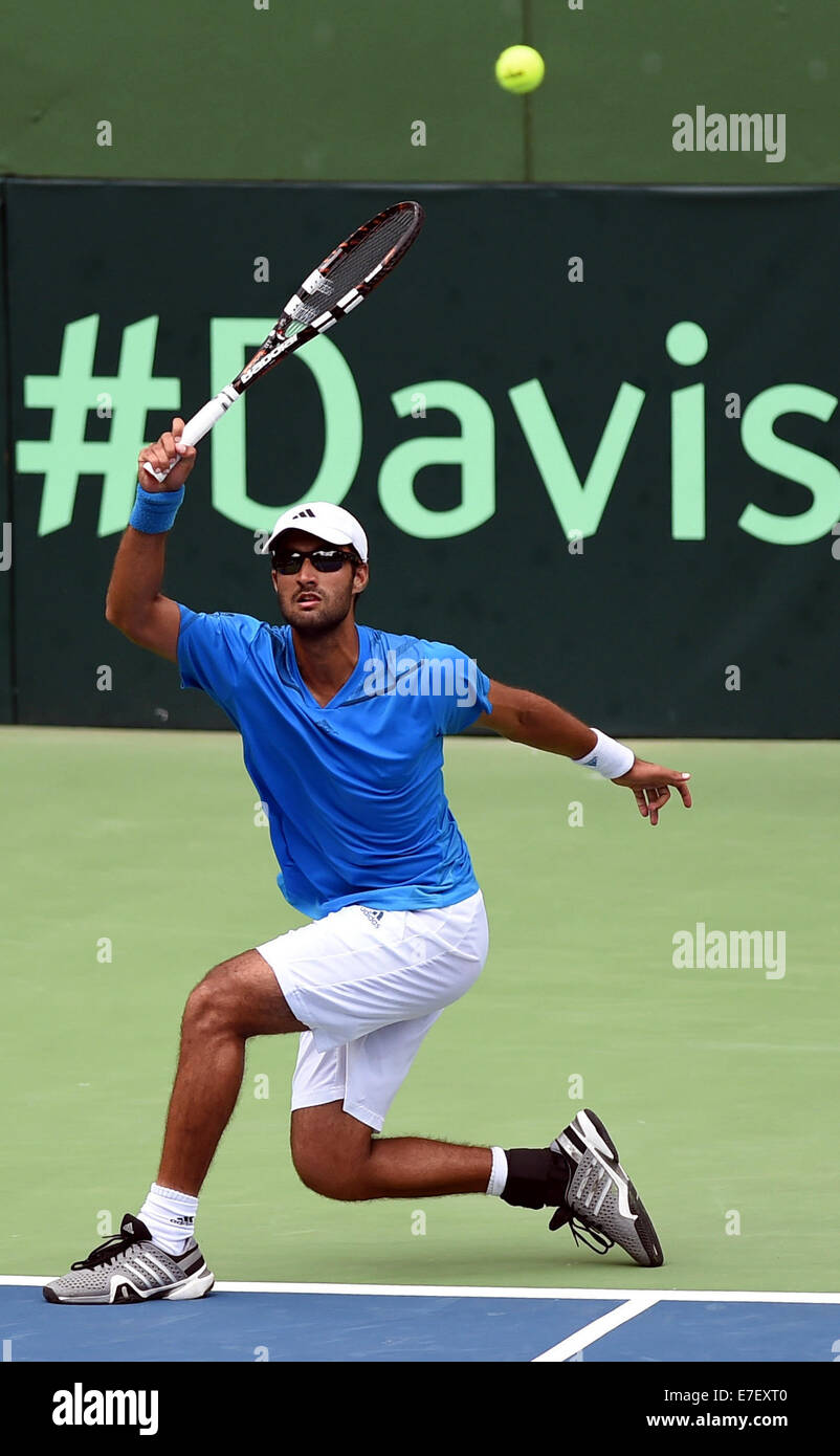 Bangalore, India. 15th Sep, 2014. Yuki Bhambri of India hits a return ...