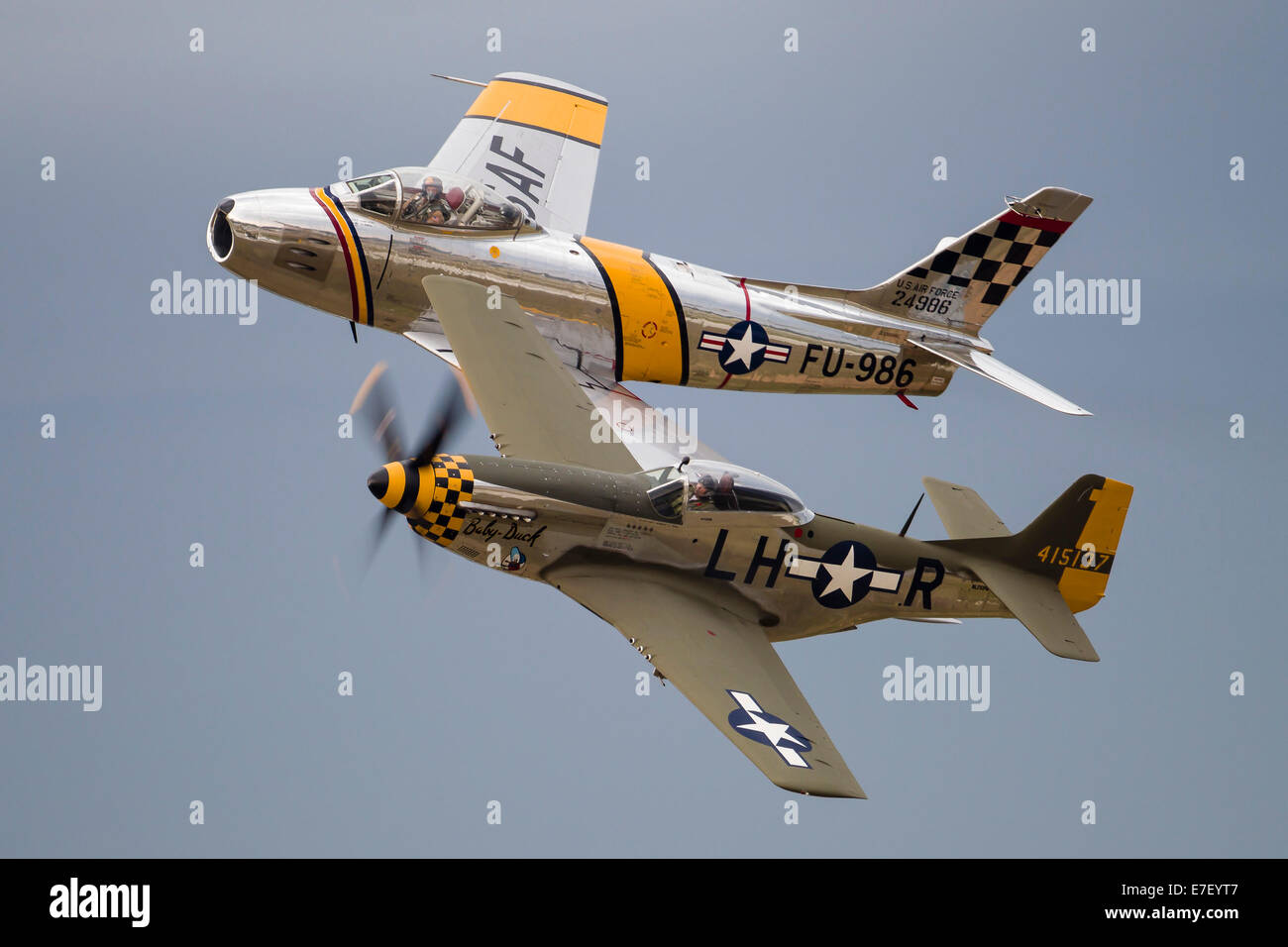 A P-51 Mustang and F-86 Sabre of the Warbird Heritage Foundation carry ...