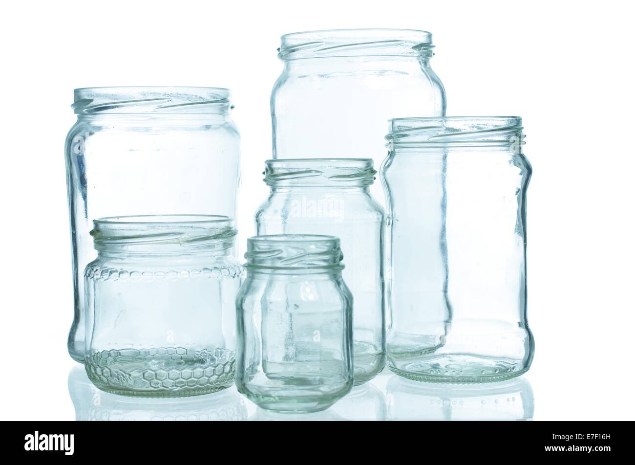 empty jars on white background Stock Photo - Alamy