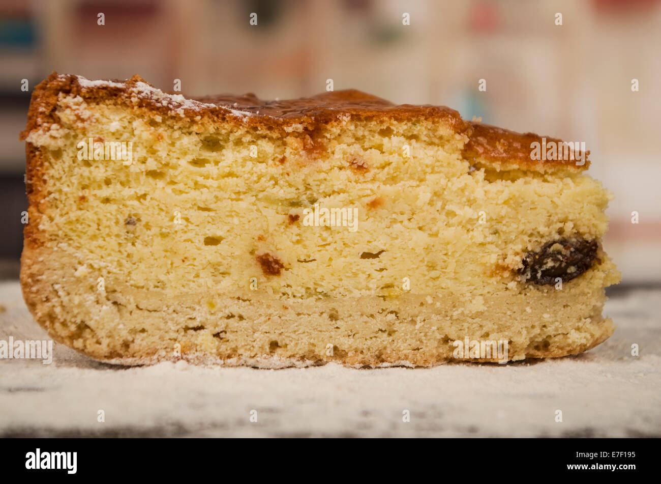 delicious piece of homemade vanilla cake decorated with caster sugar ...