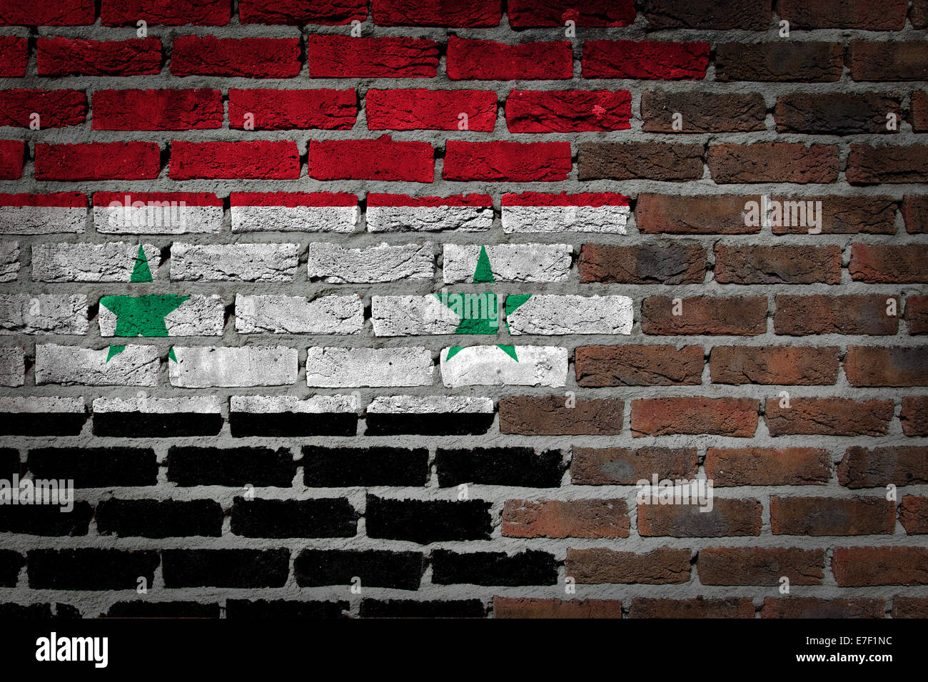Dark brick wall texture - flag painted on wall - Syria Stock Photo - Alamy
