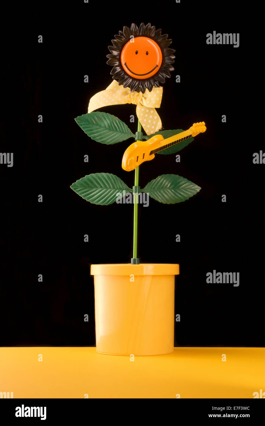 Dancing flower on a black background Stock Photo - Alamy