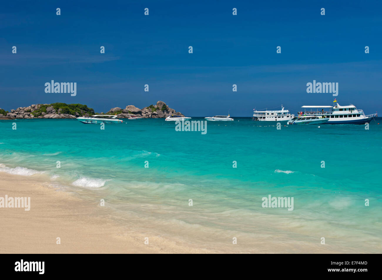 Excursion boats moored off the Similan Islands, Mu Ko Similan National ...