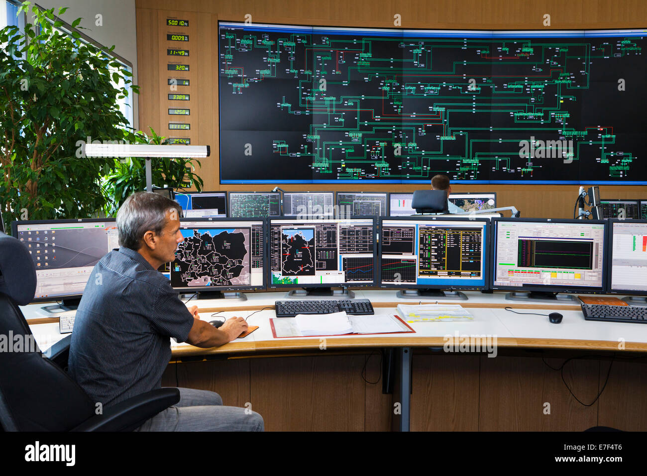 Shift supervisor Hans-Peter Polzer sitting at his work station in the ...
