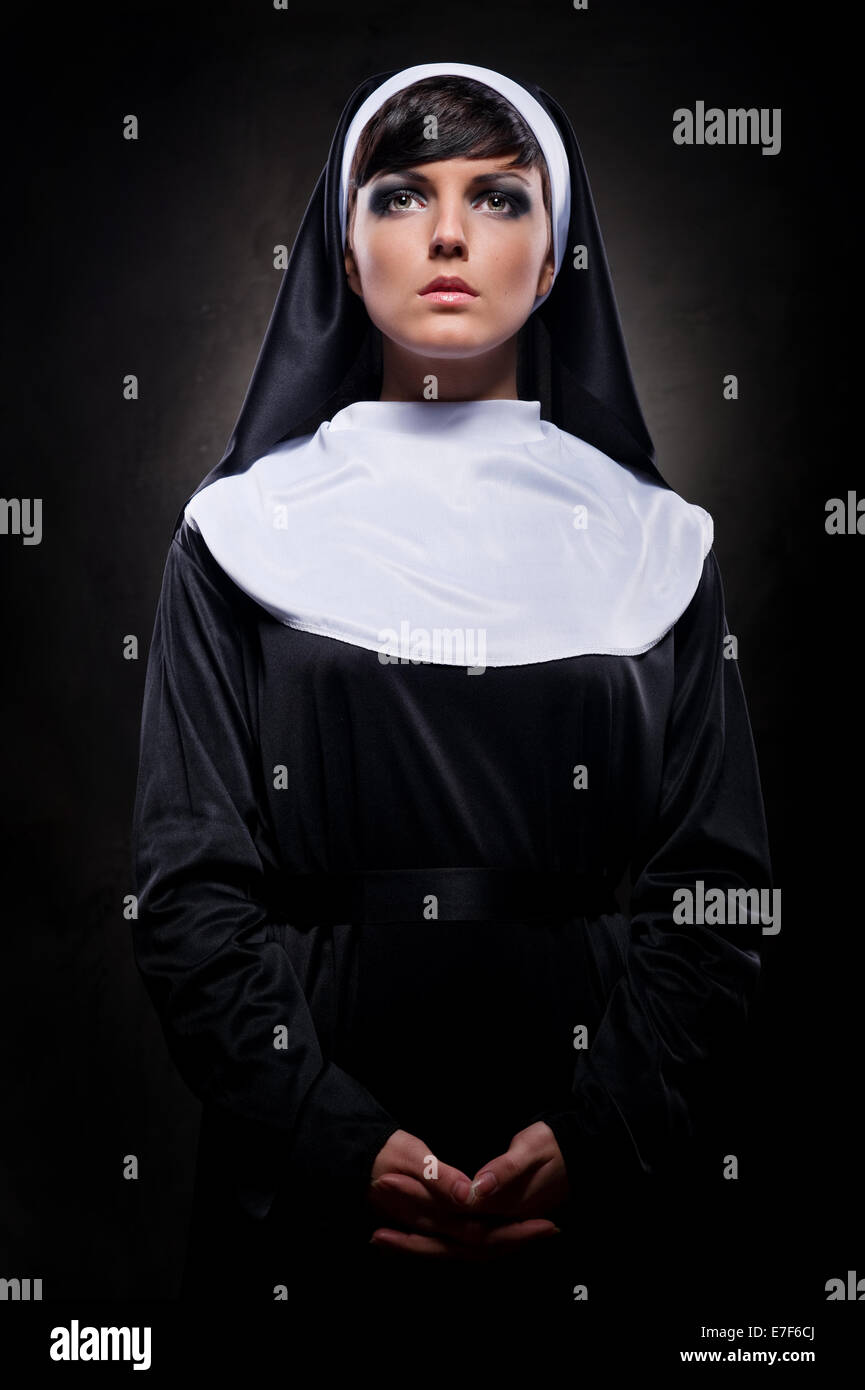 Portrait of young attractive nun Stock Photo - Alamy