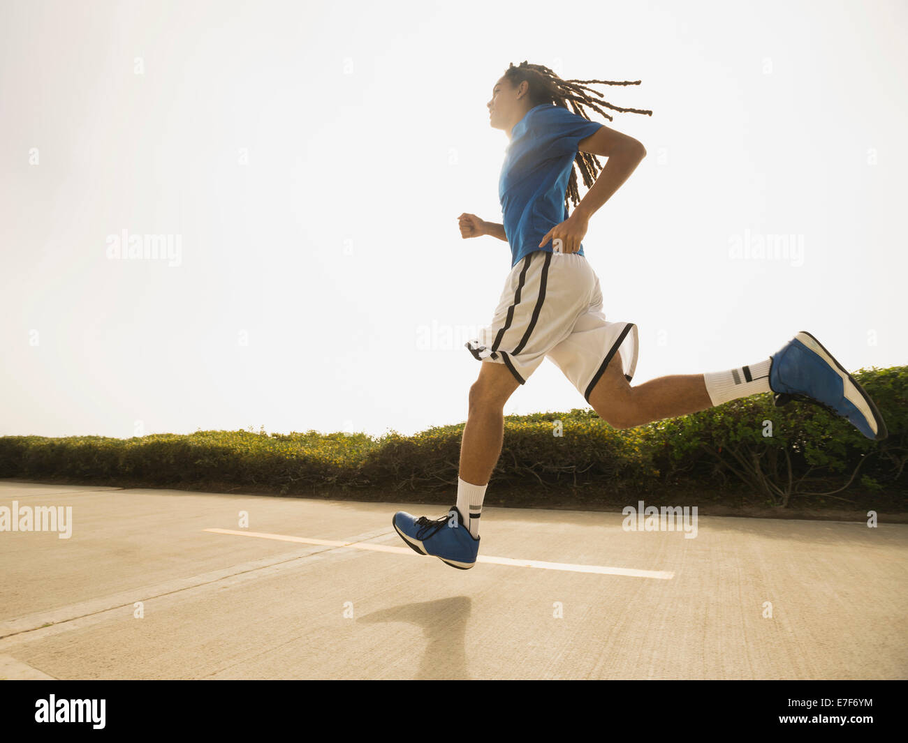 Boy jogging hi-res stock photography and images - Alamy
