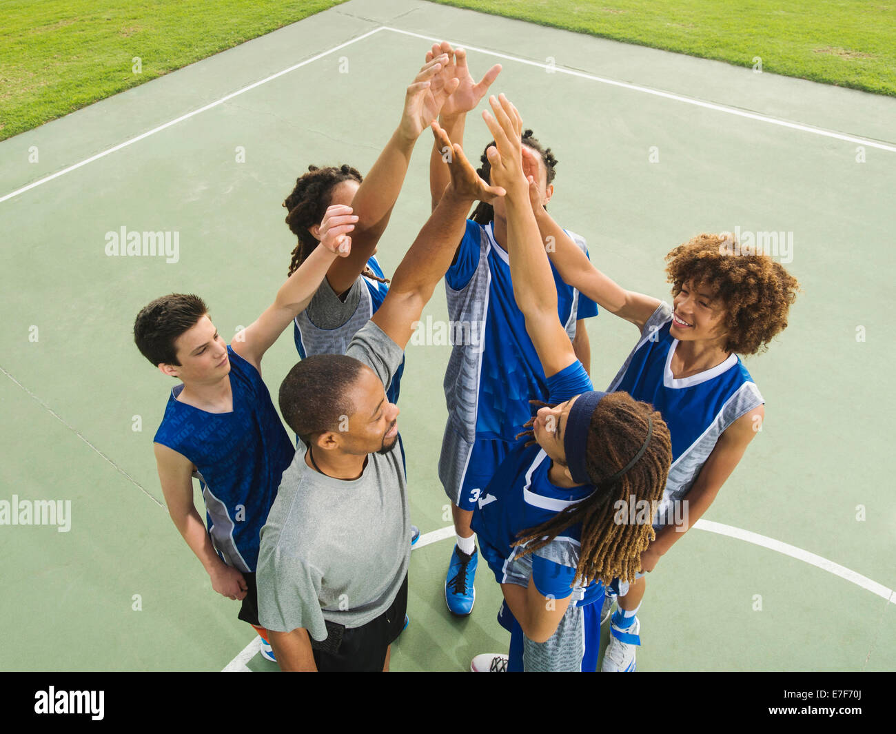 High fiving hi-res stock photography and images - Alamy
