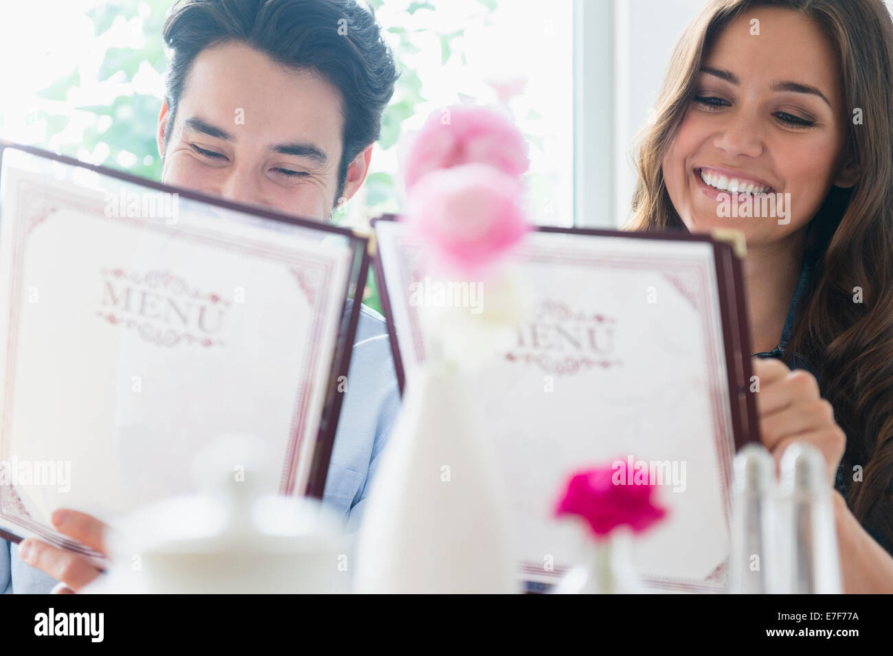 Man woman reading menus hi-res stock photography and images - Alamy