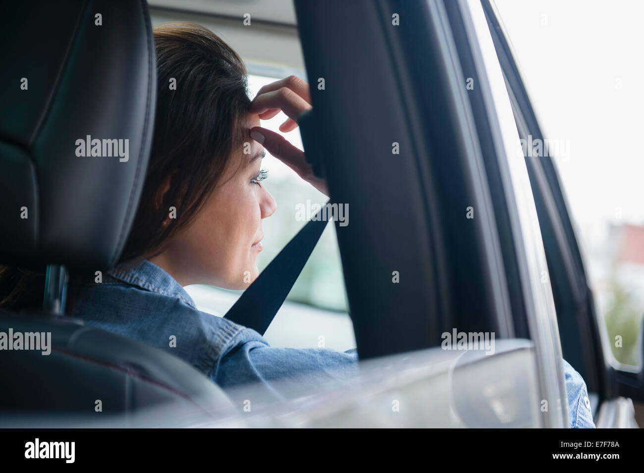 Woman smiling in car Stock Photo - Alamy