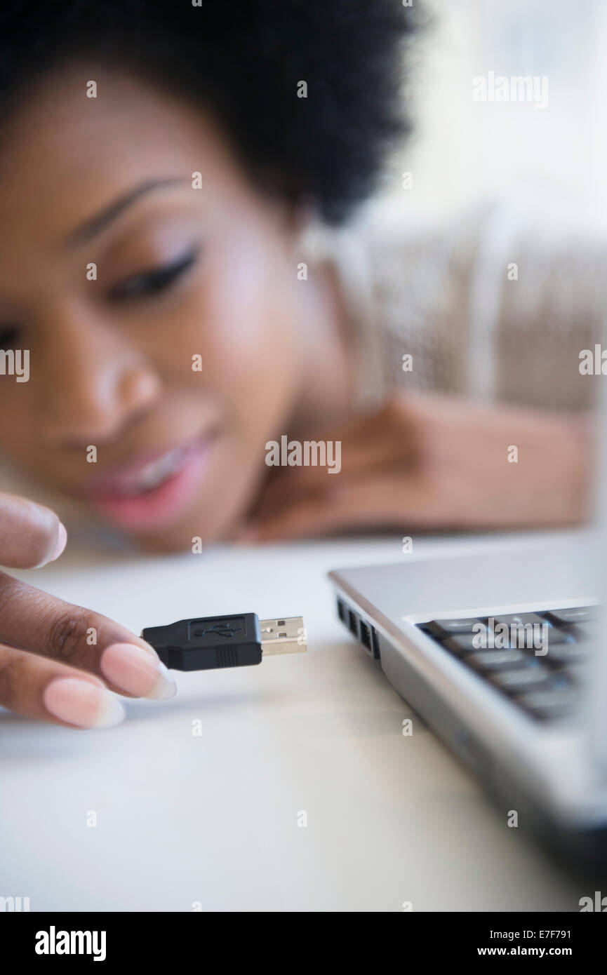 Person plugging internet cable wireless hi-res stock photography and ...