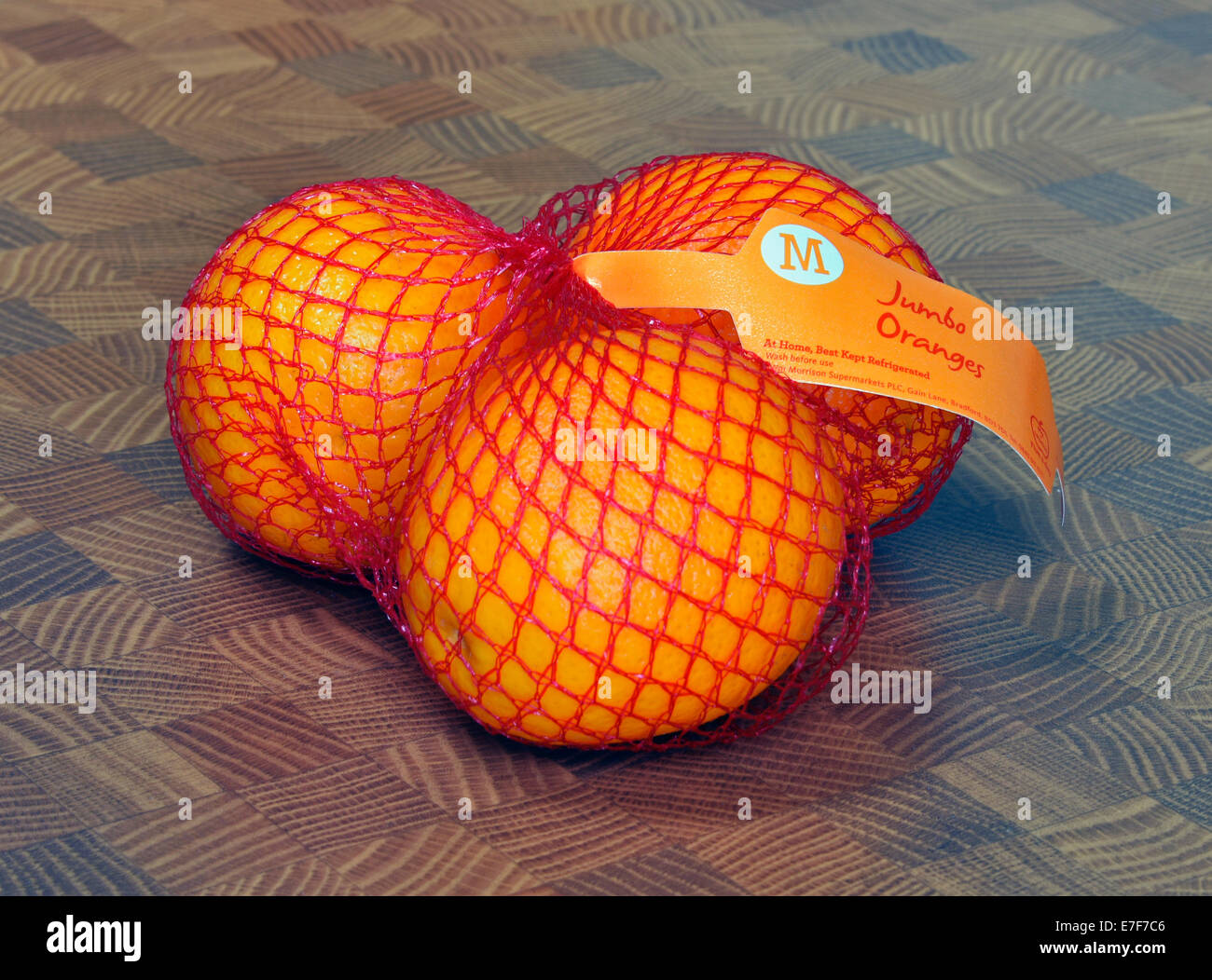 Net of three Jumbo oranges. Morrisons Supermarket Stock Photo - Alamy