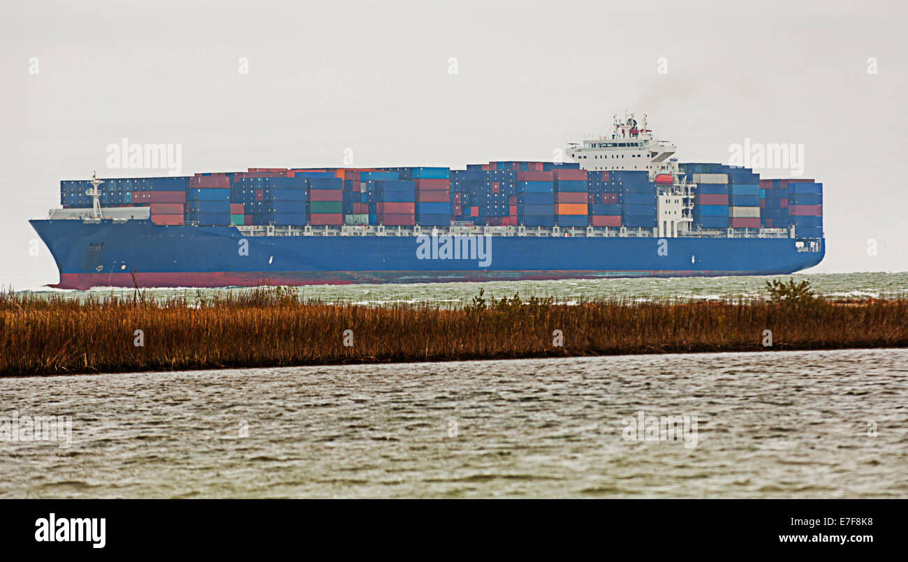 Cargo container ship on ocean Stock Photo - Alamy