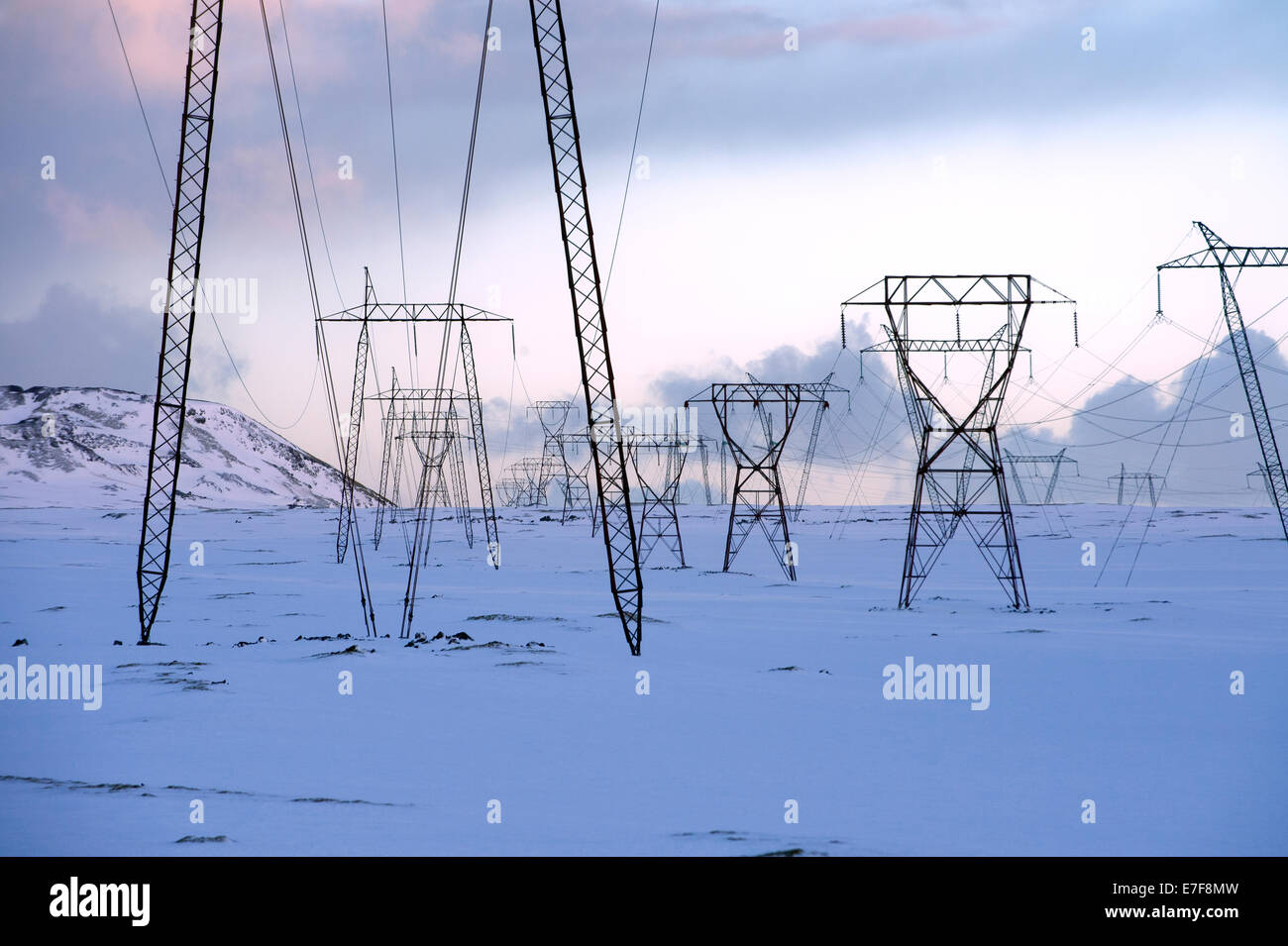 Power lines in snowy landscape Stock Photo - Alamy