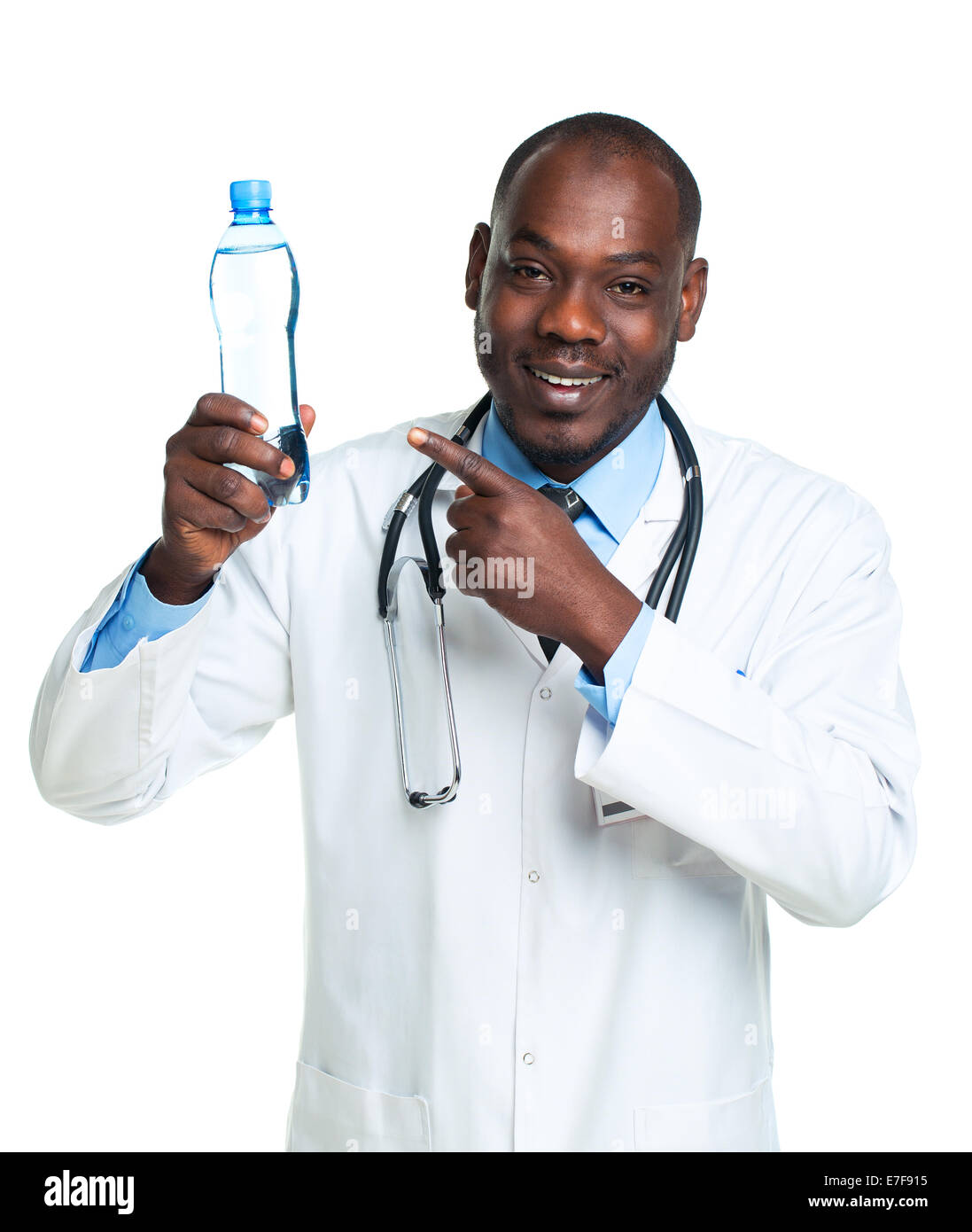 Portrait of a smiling male doctor holding bottle of water on white ...