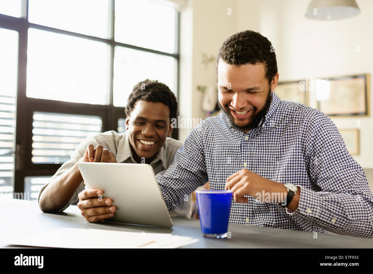 Happy businessmen working together hi-res stock photography and images ...