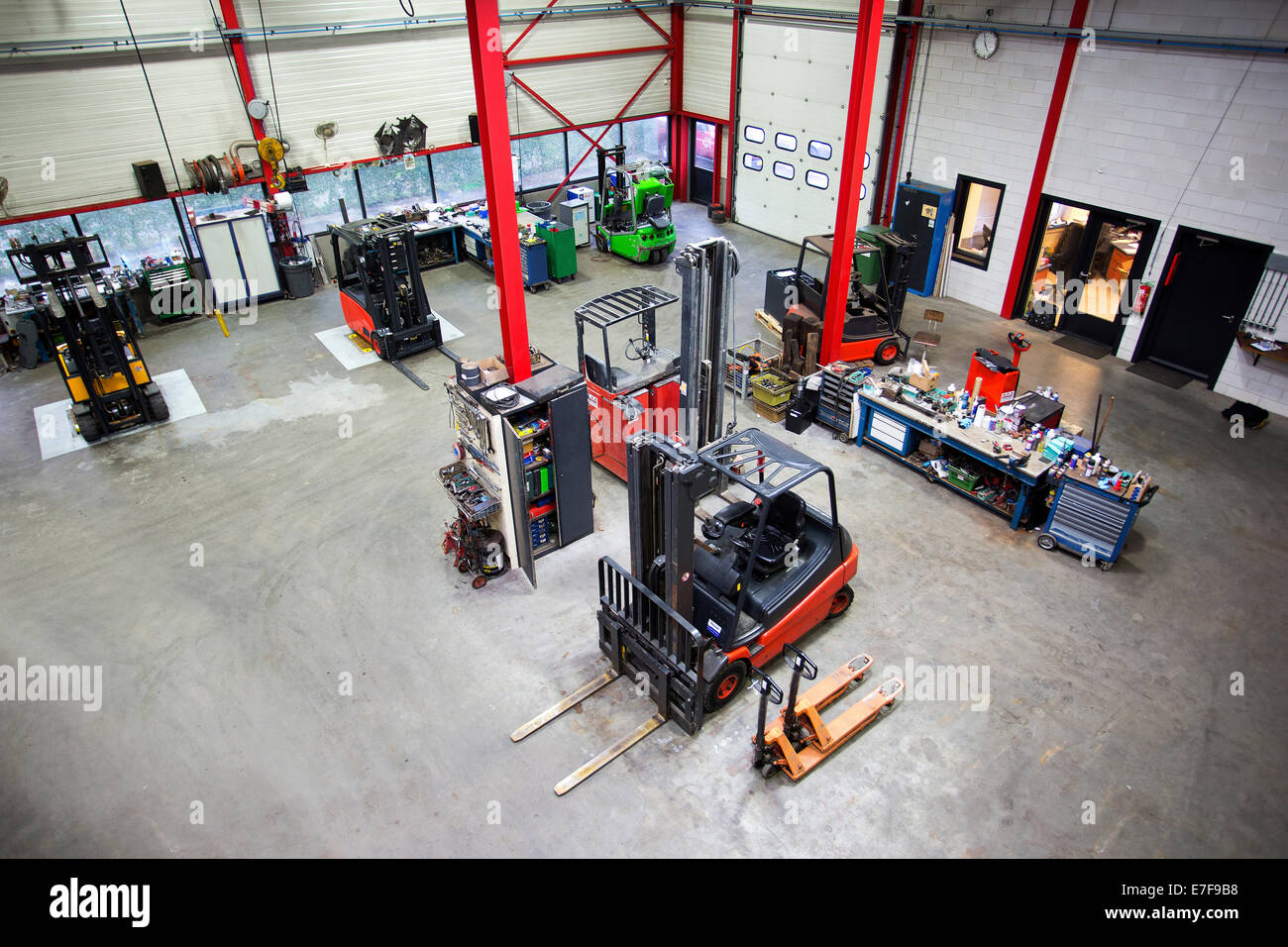 Overhead view of machinery in warehouse office Stock Photo - Alamy
