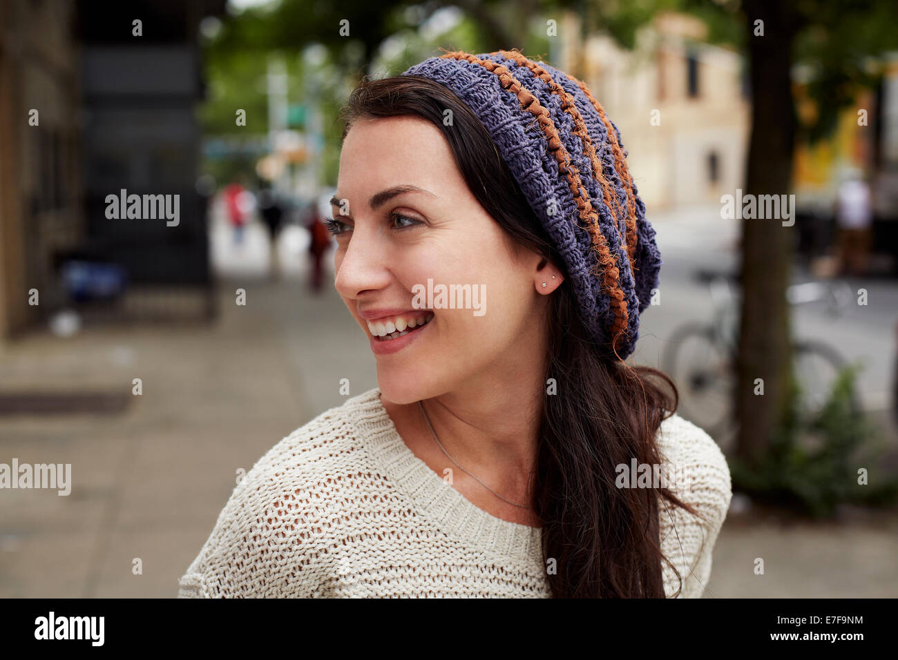 Happy smiling woman walking street hi-res stock photography and images ...