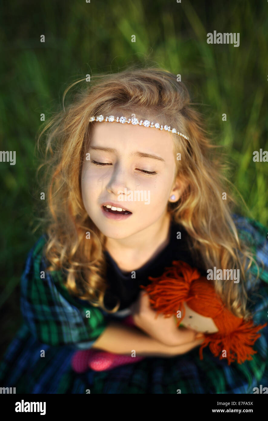 Crying doll hi-res stock photography and images - Alamy