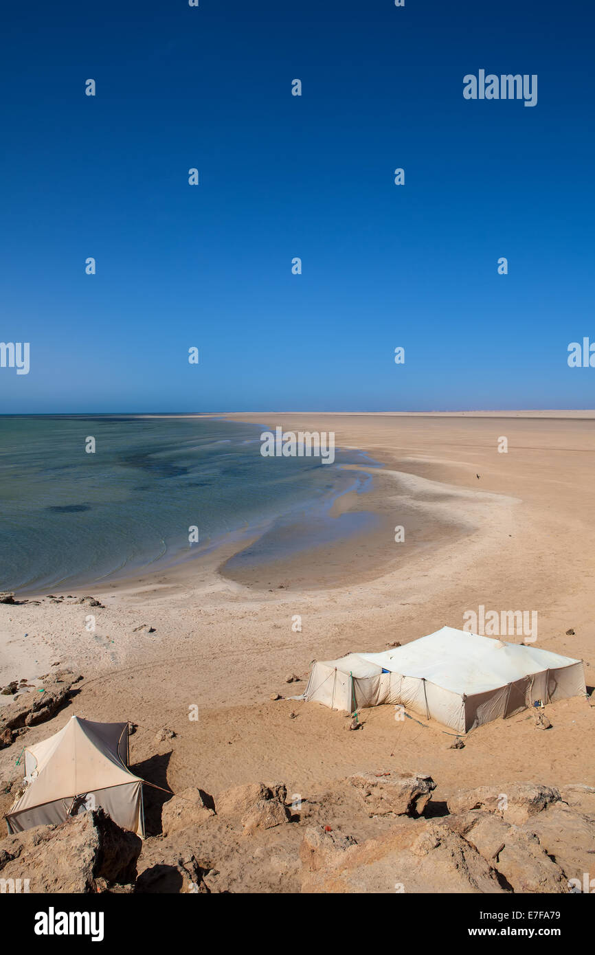 the desert and the sea in western sahara near Daklha Stock Photo - Alamy