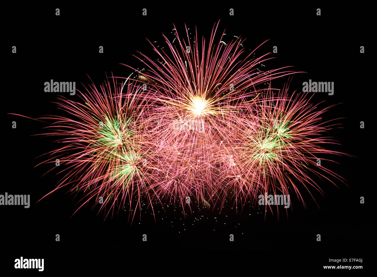 Red colorful fireworks on the black sky background Stock Photo - Alamy