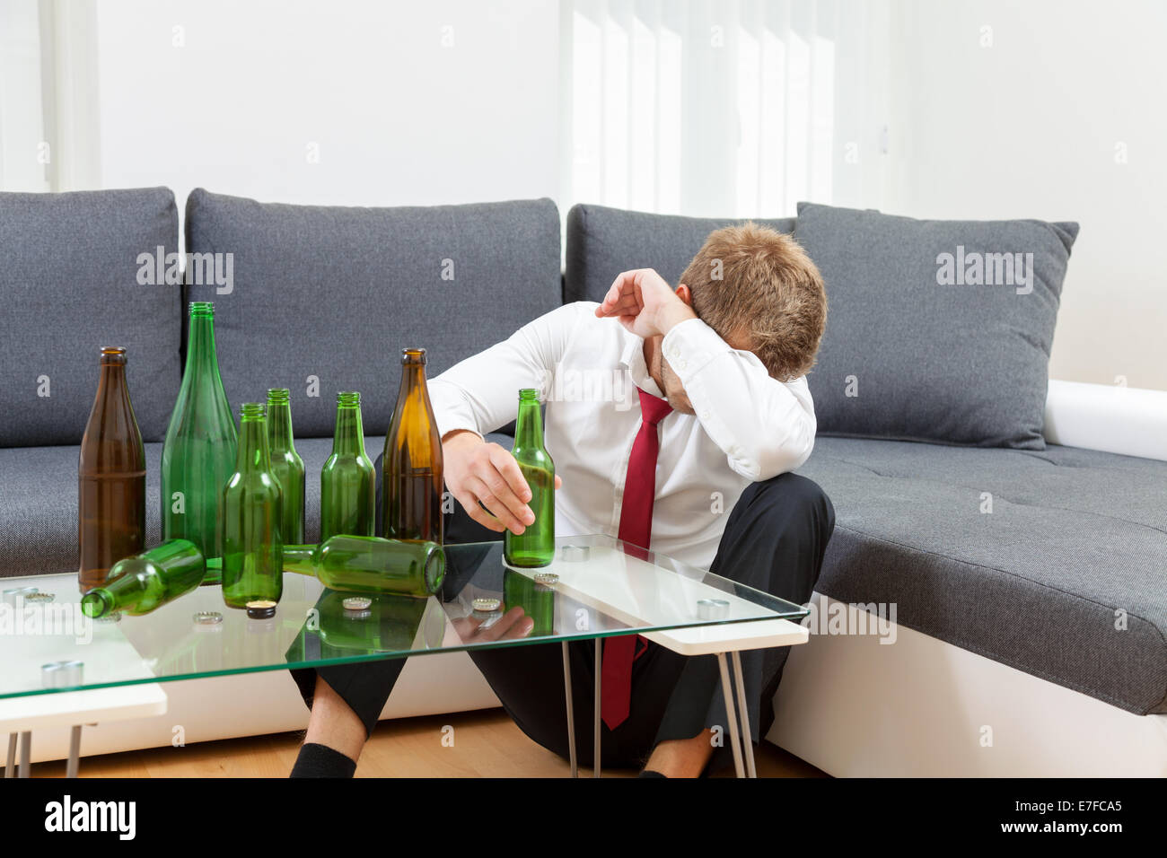 Businessman sofa sad hi-res stock photography and images - Alamy