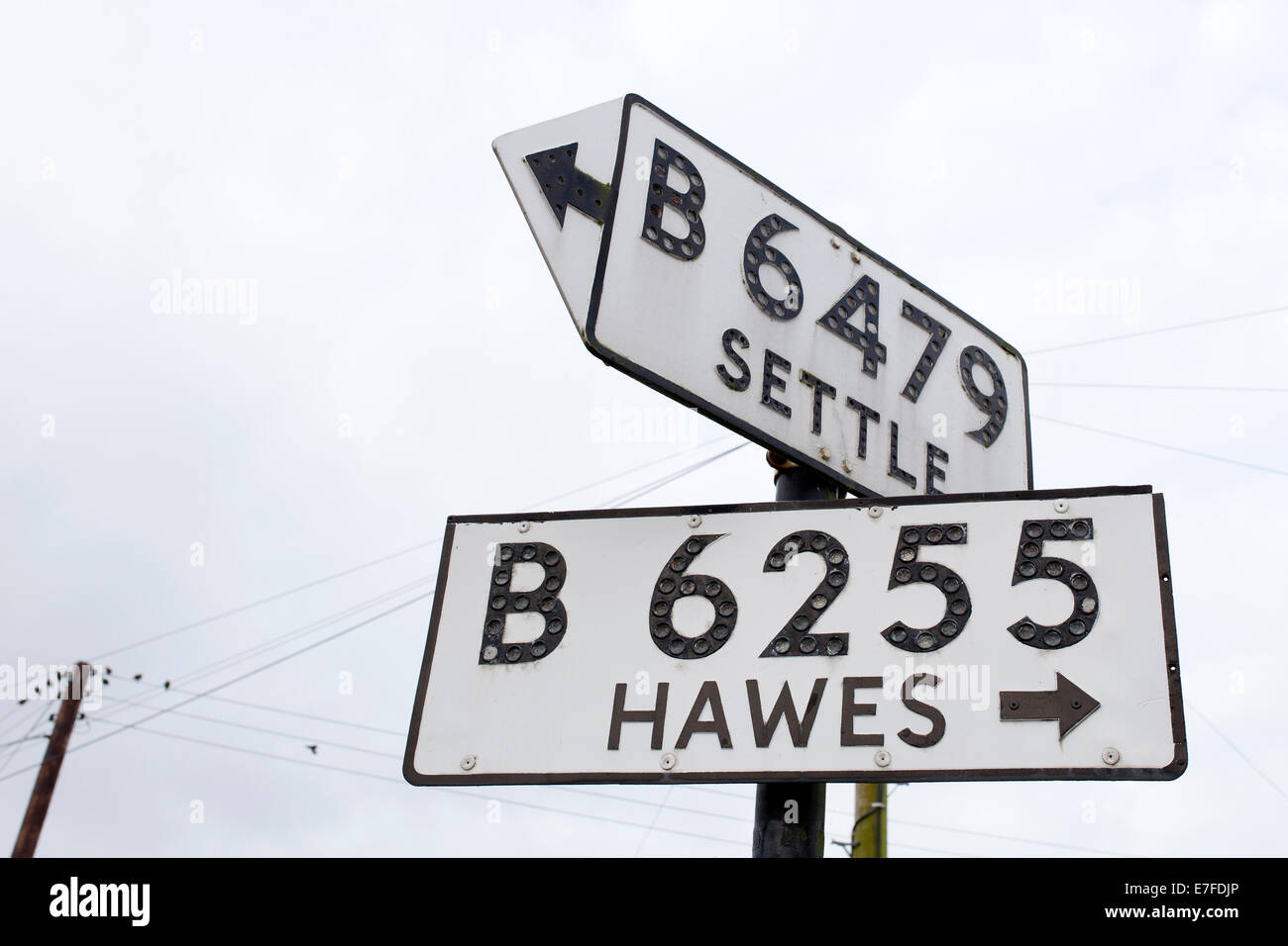 Old road signs for Settle and Hawes in Horton in Ribblesdale ...