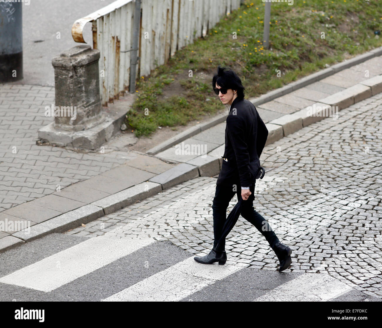 Warsaw man crossing street Stock Photo - Alamy