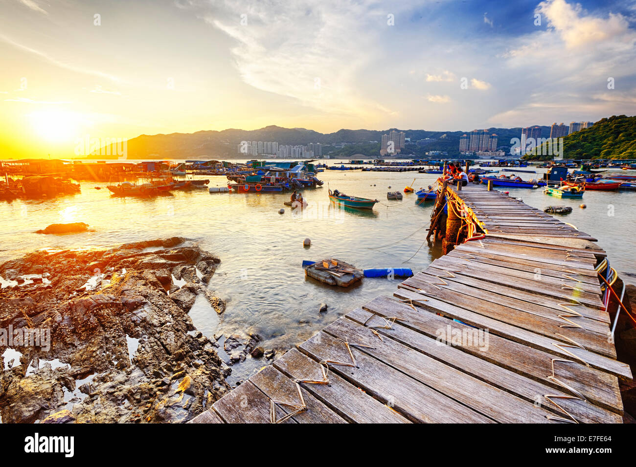Boat pier at sunset. Beautiful landscape Stock Photo - Alamy