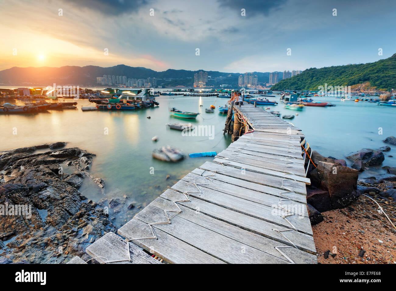 Boat pier at sunset. Beautiful landscape Stock Photo - Alamy