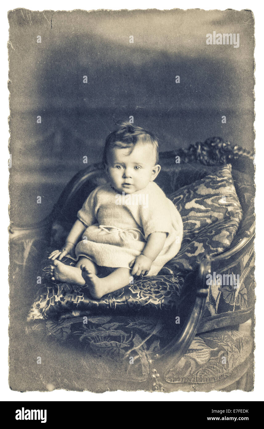 GERMANY, BERLIN- CIRCA 1890: old sepia picture from little baby with ...