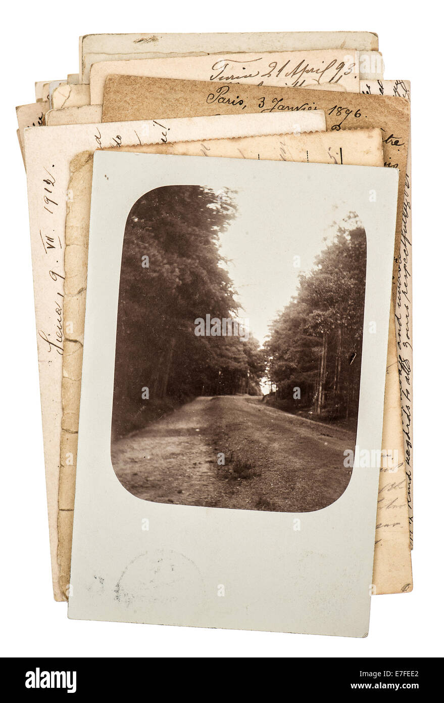 pile of antique postcards and retro style photo isolated on white ...