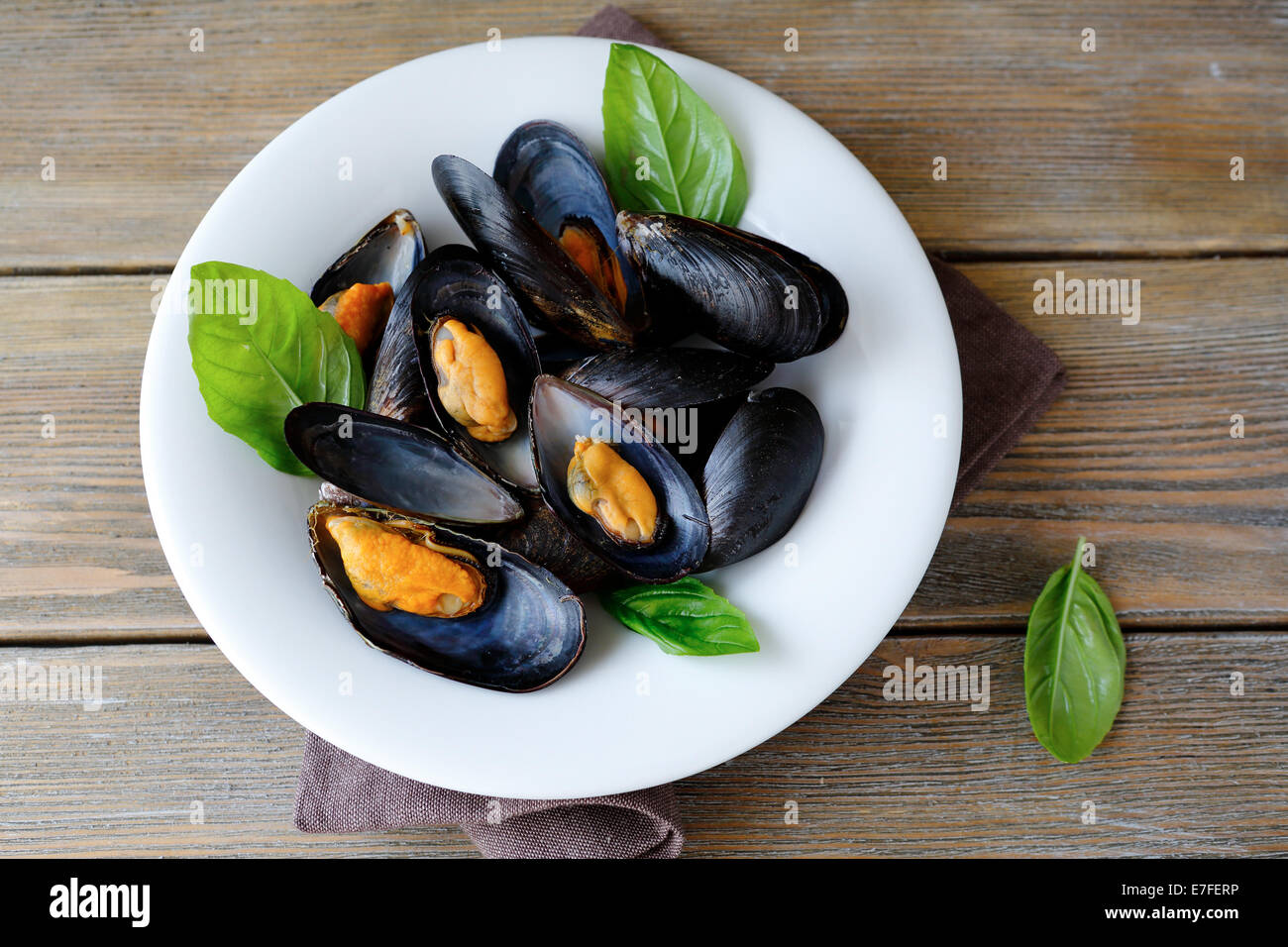 Mussels in sauce, top view Stock Photo - Alamy